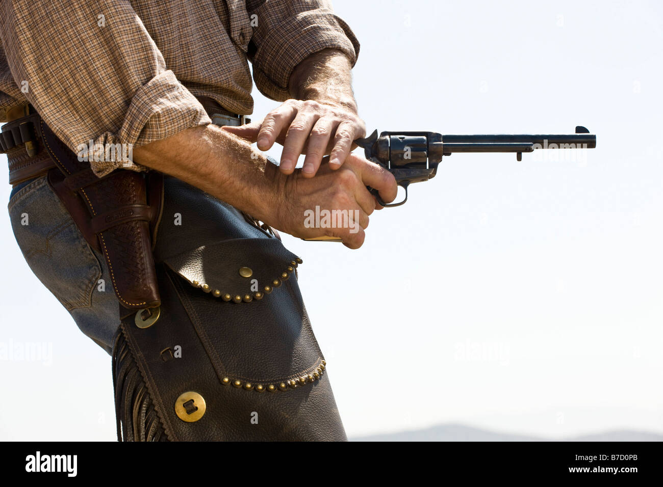 Western cowboy gun -Fotos und -Bildmaterial in hoher Auflösung – Alamy