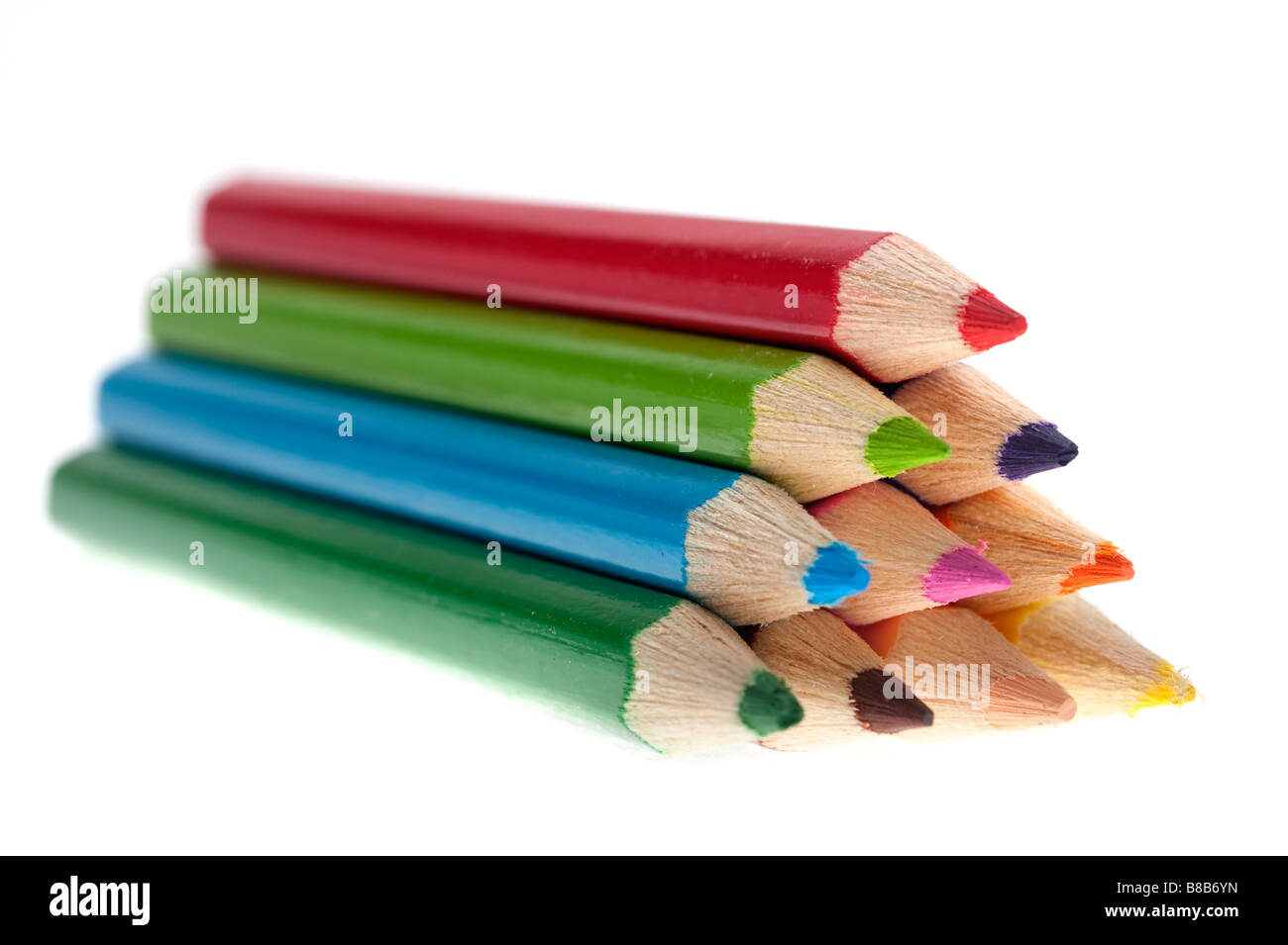 Gestapelte gemischt farbige Stifte Stockfotografie - Alamy