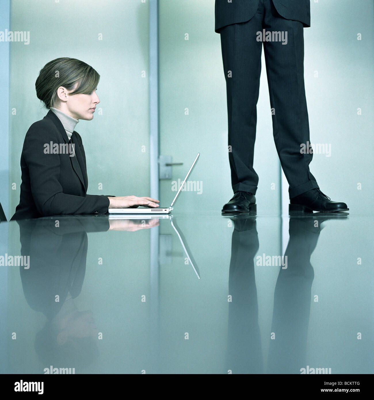 Woman dominating businessman -Fotos und -Bildmaterial in hoher ...