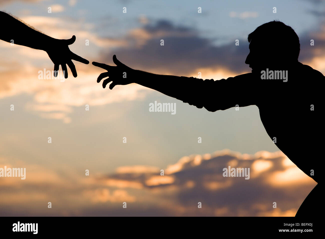 Hand ausstrecken oder wegziehen Stockfotografie - Alamy