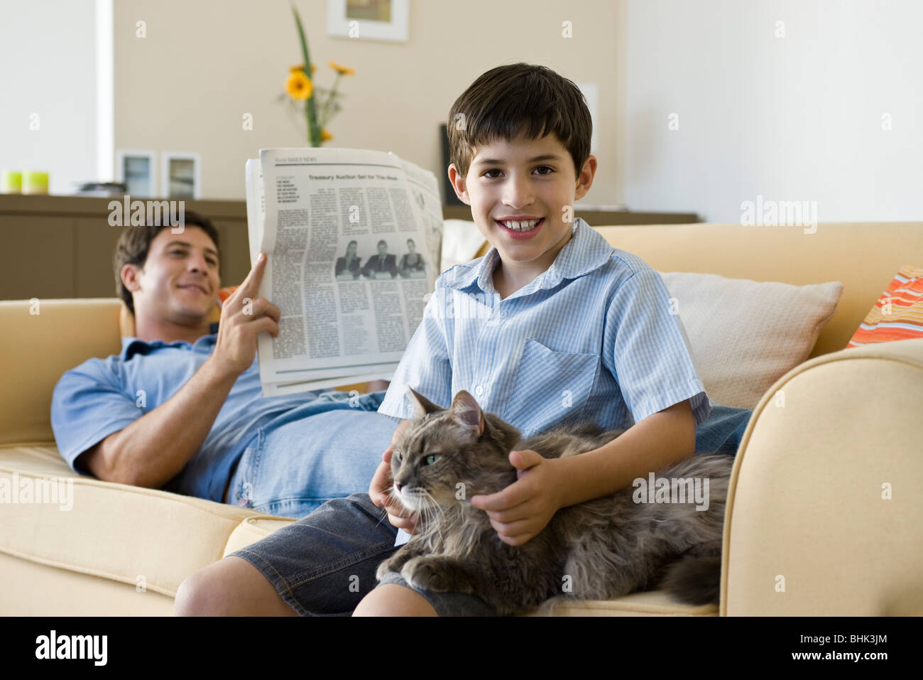 Auf seinem schoß sitzen Stockfotos und -bilder Kaufen - Alamy