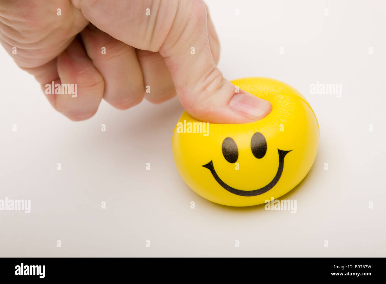 Gelbe Smiley mit einem Daumen gequetscht; Edmonton, Alberta, Kanada ...