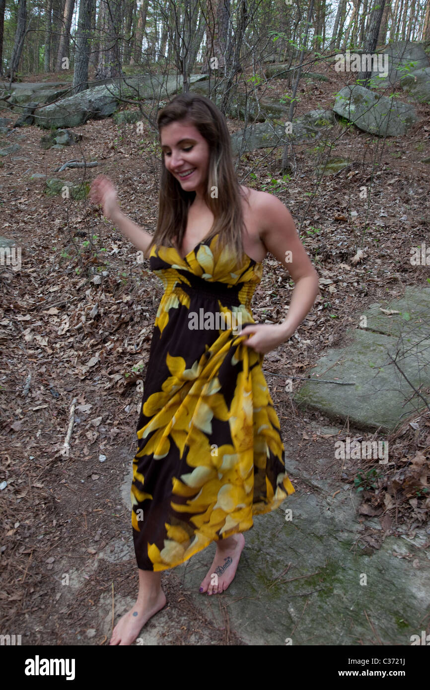 Pretty woman waling through woods -Fotos und -Bildmaterial in hoher ...