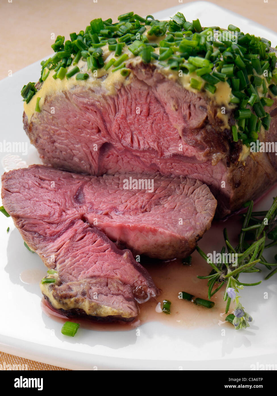 Roast herb crusted welsh lamb rump joint -Fotos und -Bildmaterial in ...