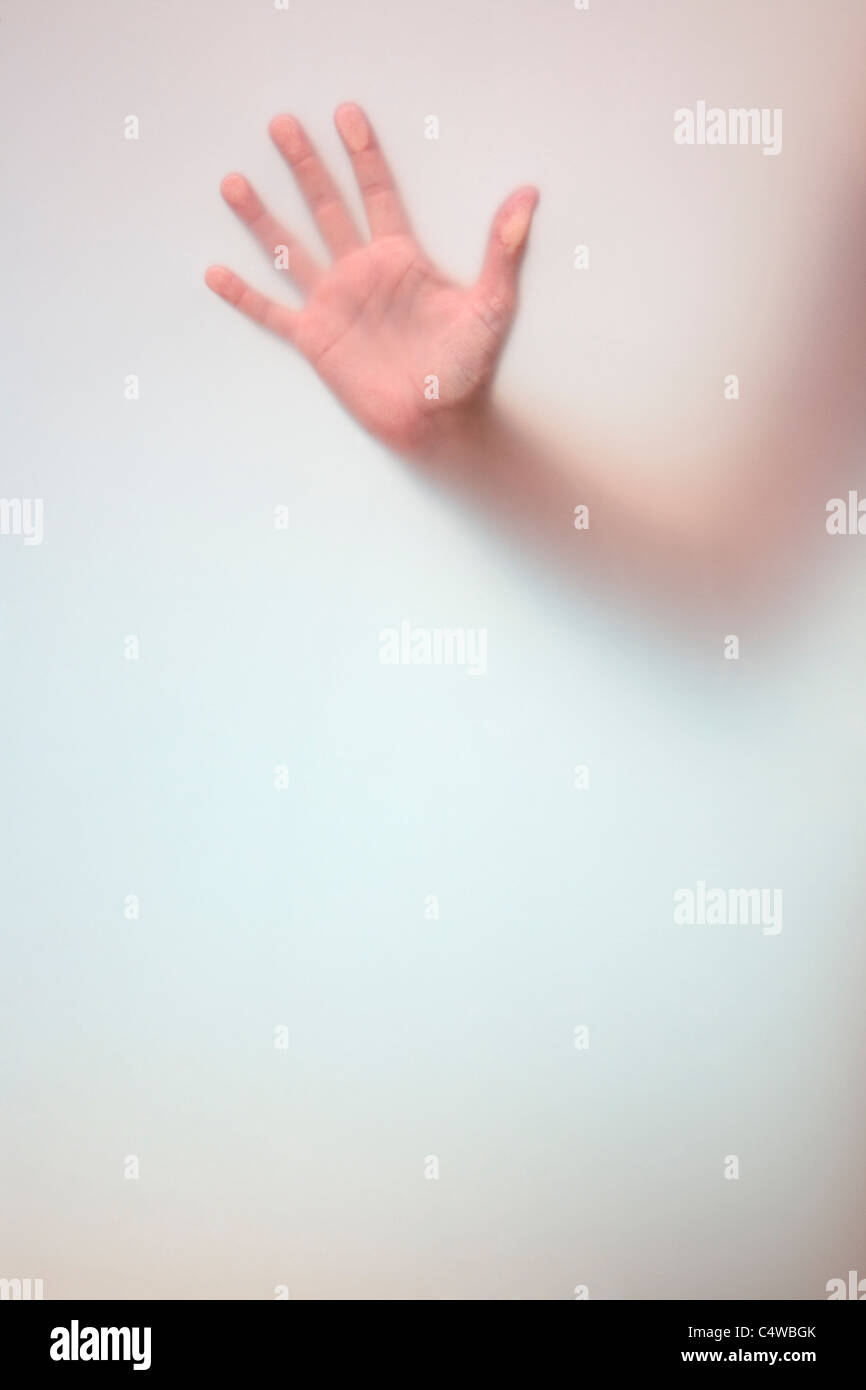 Silhouette hand against frosted glass -Fotos und -Bildmaterial in hoher ...