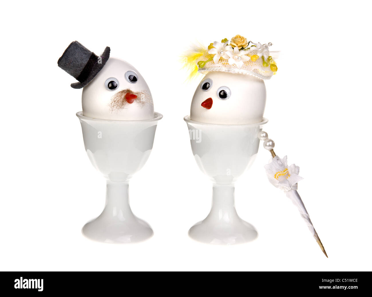 Lustige Ei paar mit Gesicht, Hut und Googly Augen Stockfotografie - Alamy