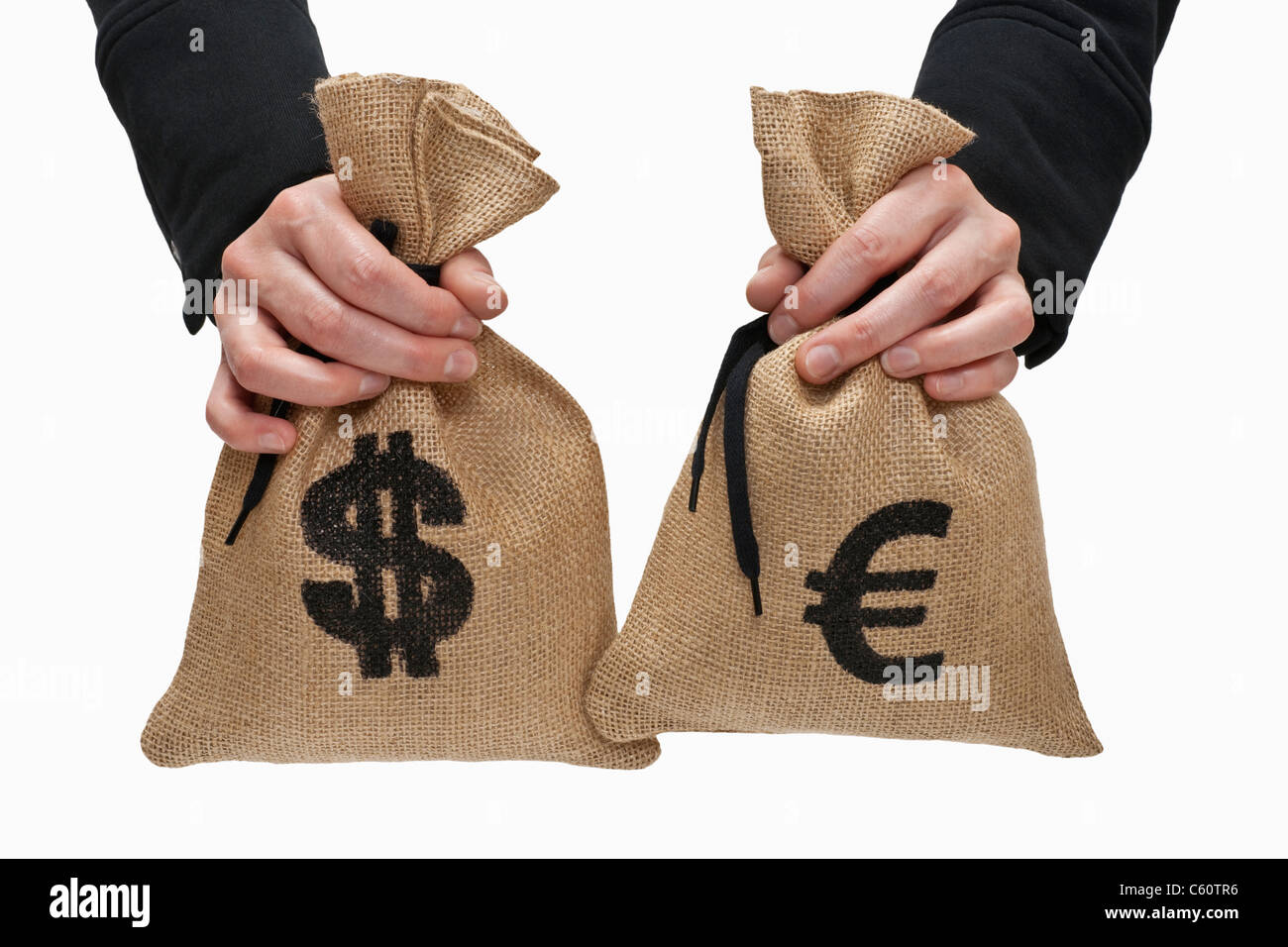 ein Geldbeutel mit Euro-Zeichen und ein Geldbeutel mit Dollarzeichen ...