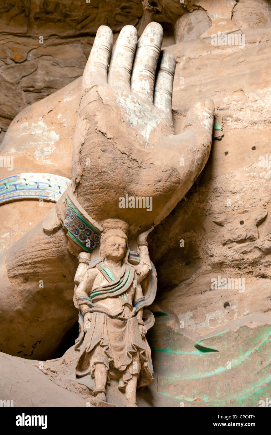 Riesige Buddha-Statuen in Yungang Grotten ist eines der größten - Skala ...