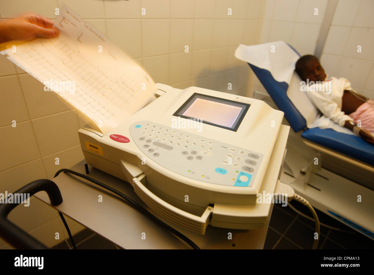 Woman undergoing electrocardiography ekg examination -Fotos und ...