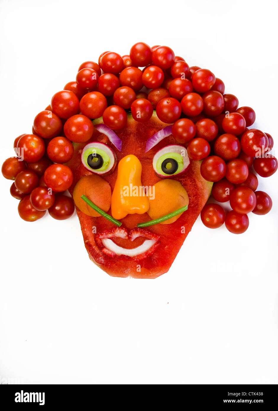 Ein Obst- und Gesicht aus verschiedenen Teilen gefertigt ...