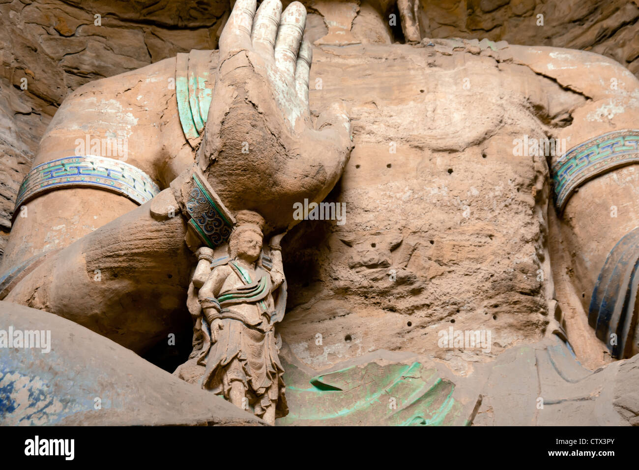 Riesige Buddha-Statuen in Yungang Grotten ist eines der größten - Skala ...