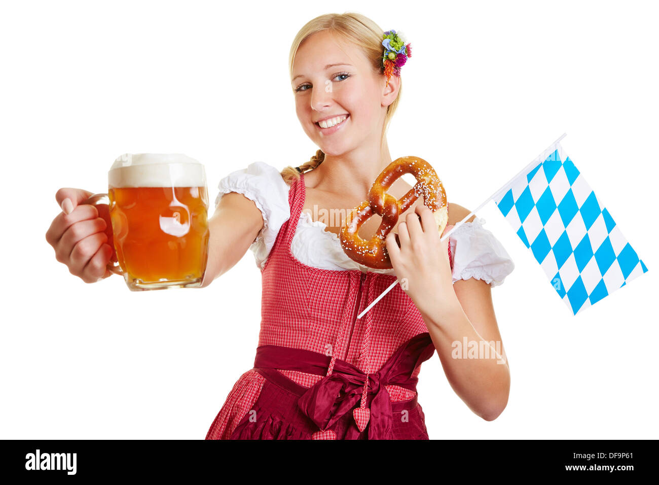 Glückliche Frau in ein Dirndl mit Bier, Brezel und eine bayerische ...