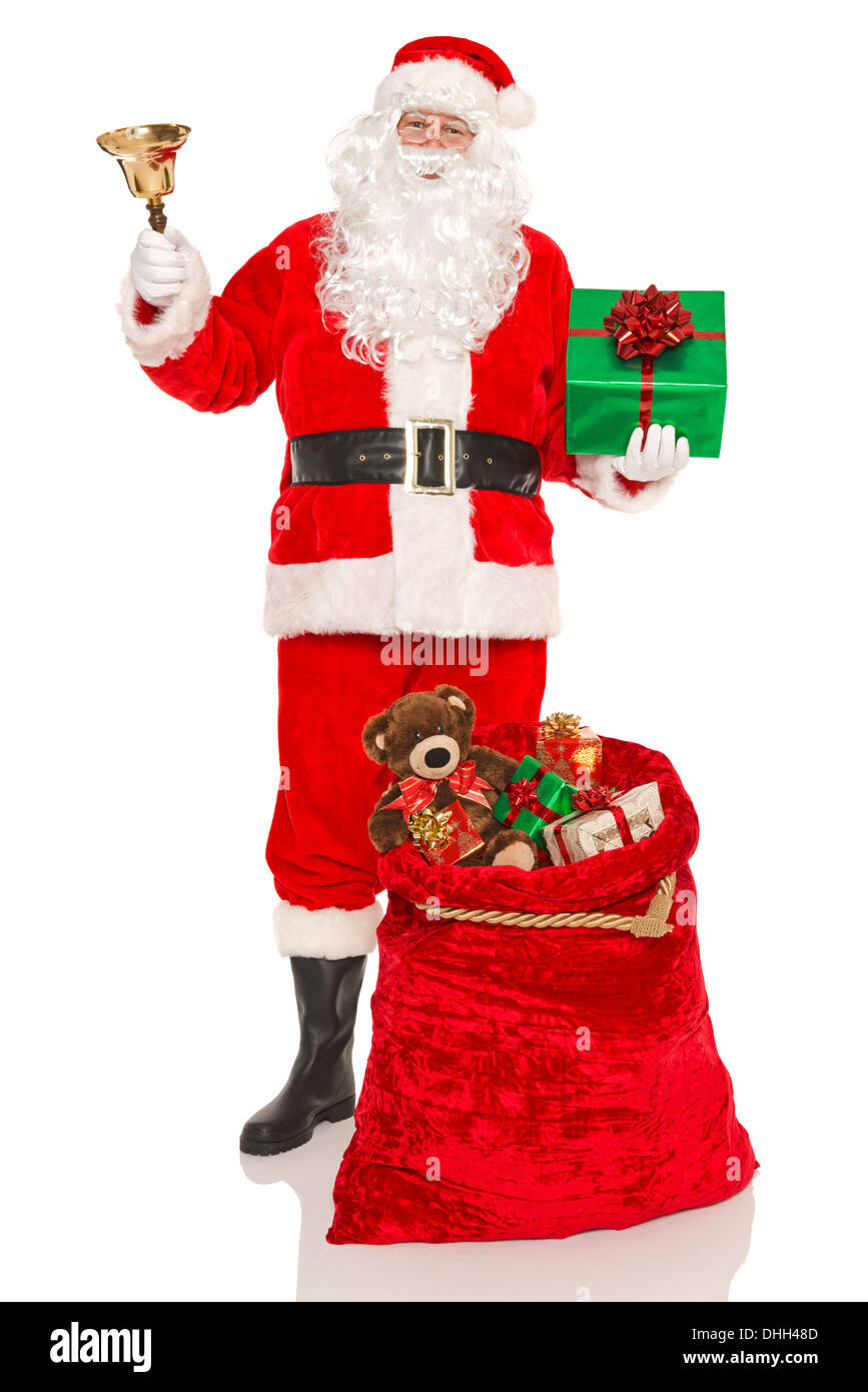 Nikolaus oder Weihnachtsmann einen Sack voller Geschenke und halten ...