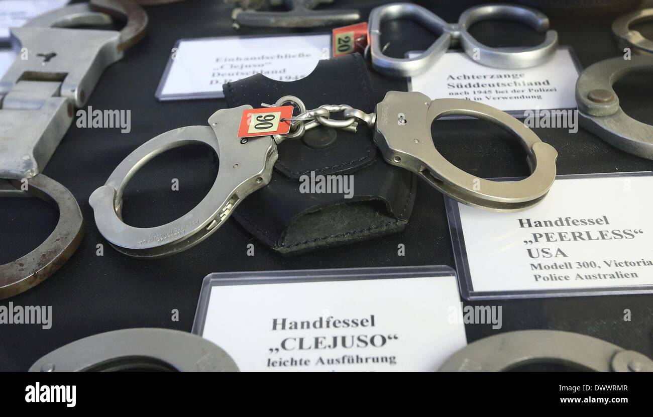 Handcuffs Put In Stockfotos und -bilder Kaufen - Alamy