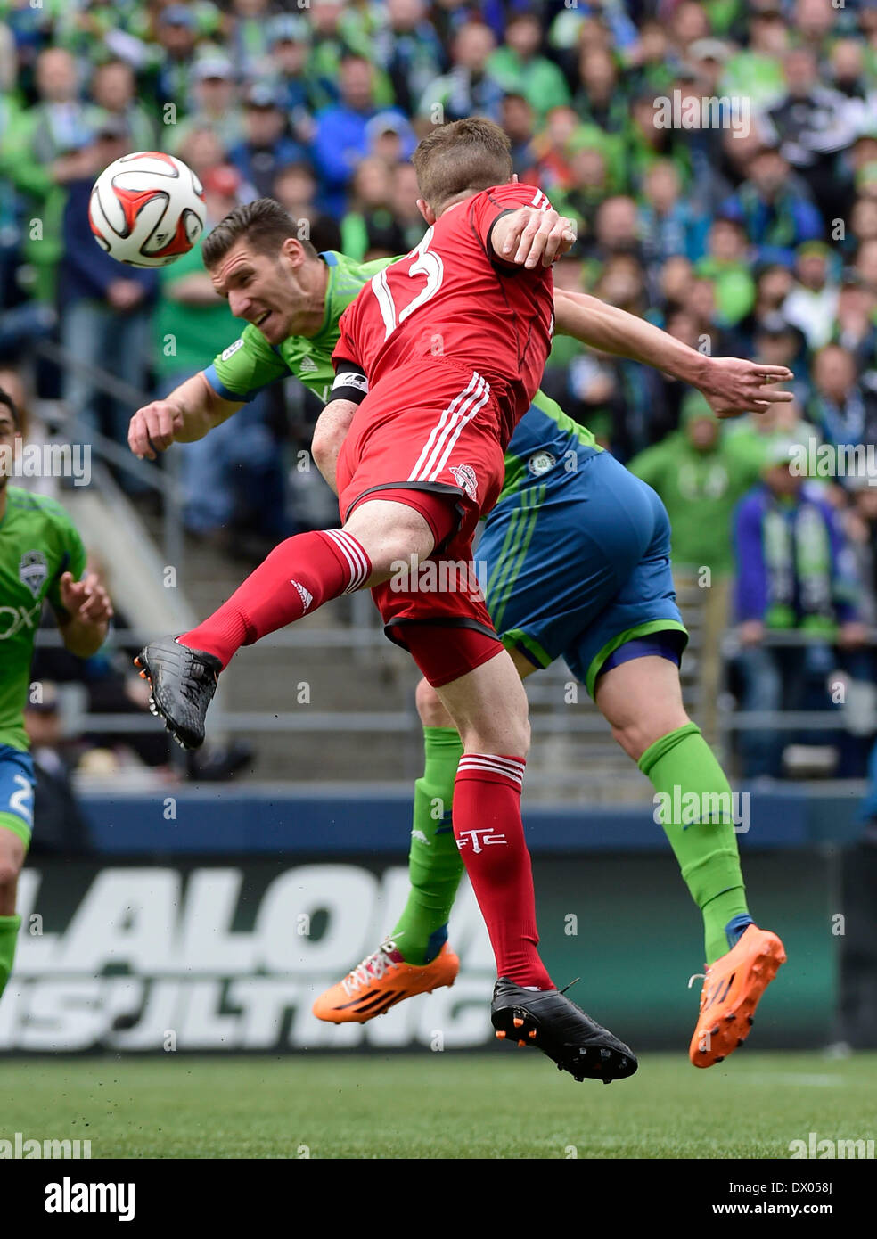 15. März 2014. Seattle Sounders FC vorwärts Kenny Cooper #33 Köpfe den ...