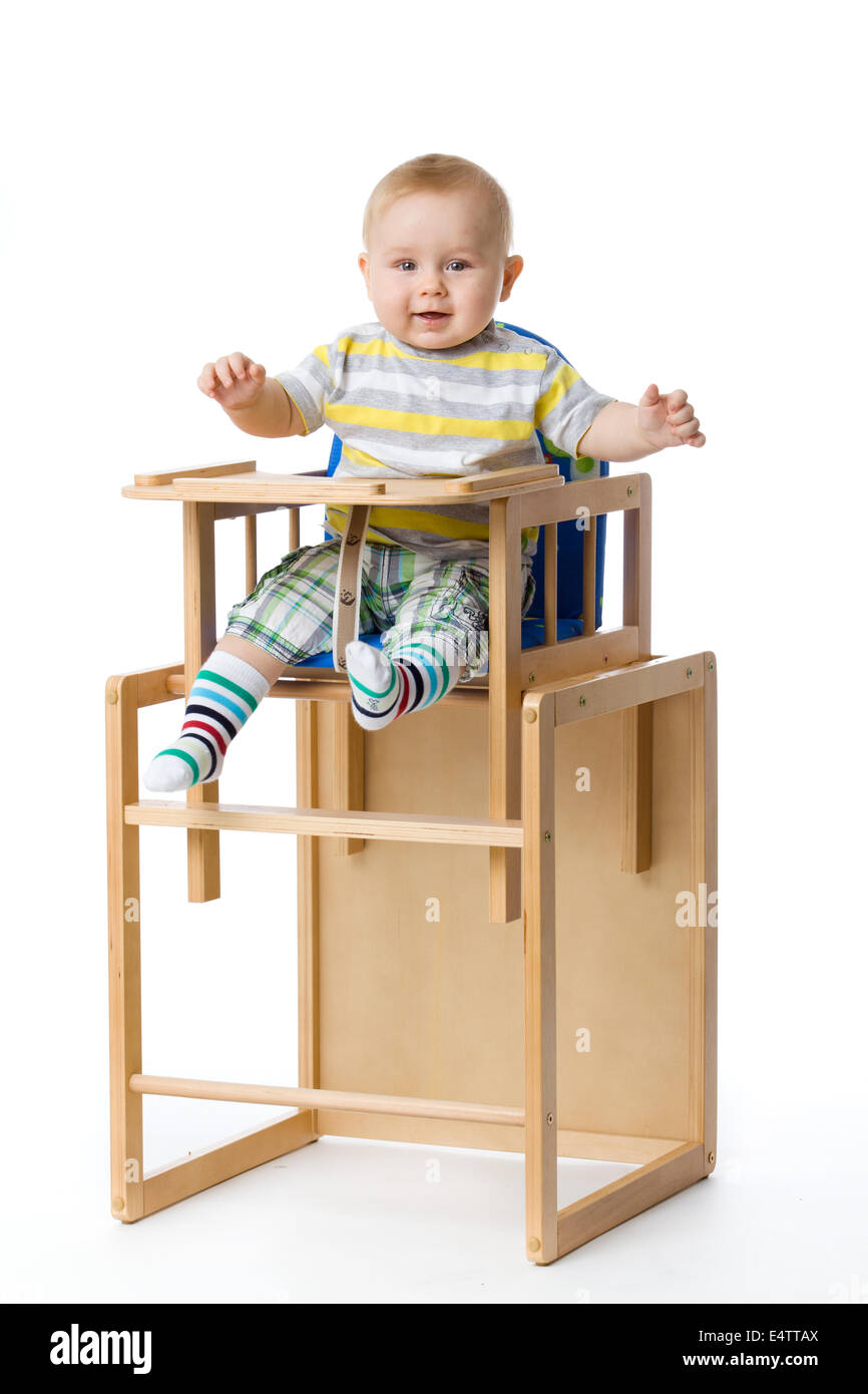 Baby im Hochstuhl sitzen Stockfotografie - Alamy
