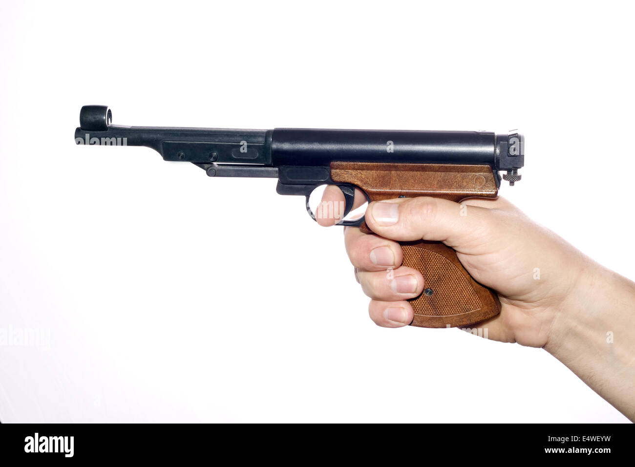 Pneumatische Pistole in der Hand über weiß Stockfotografie - Alamy