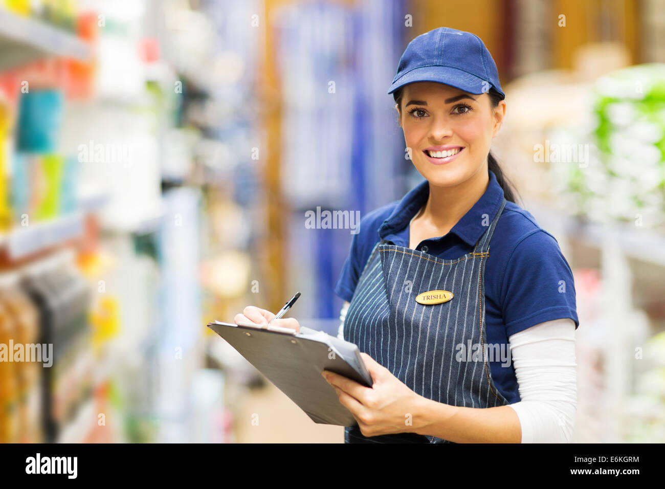 Female shop assistant uniform -Fotos und -Bildmaterial in hoher ...