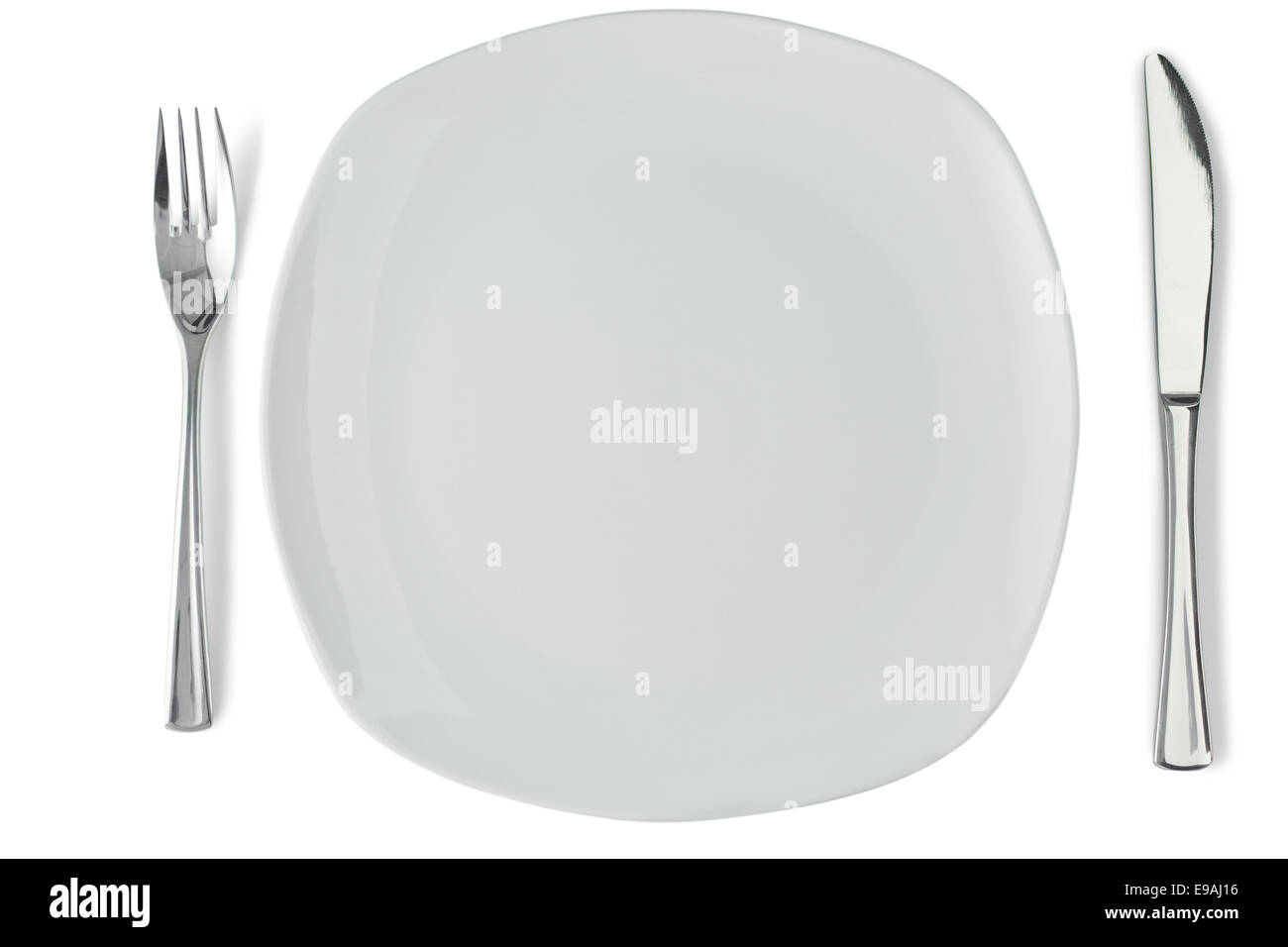 Weißen Teller mit Messer und Gabel Silber Stockfotografie - Alamy