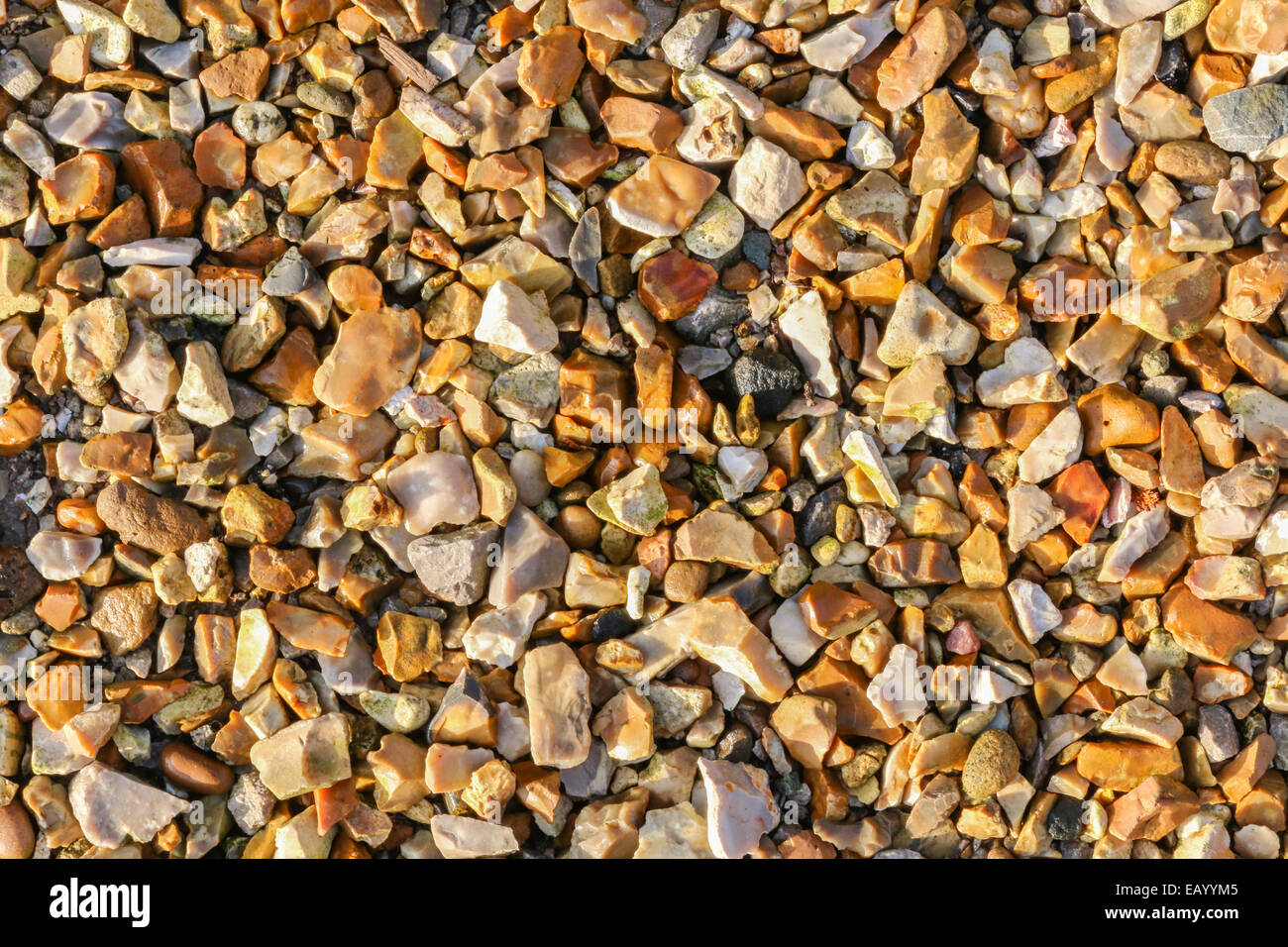 Goldene farbige Stein Splitt für Hintergrund Stockfotografie - Alamy