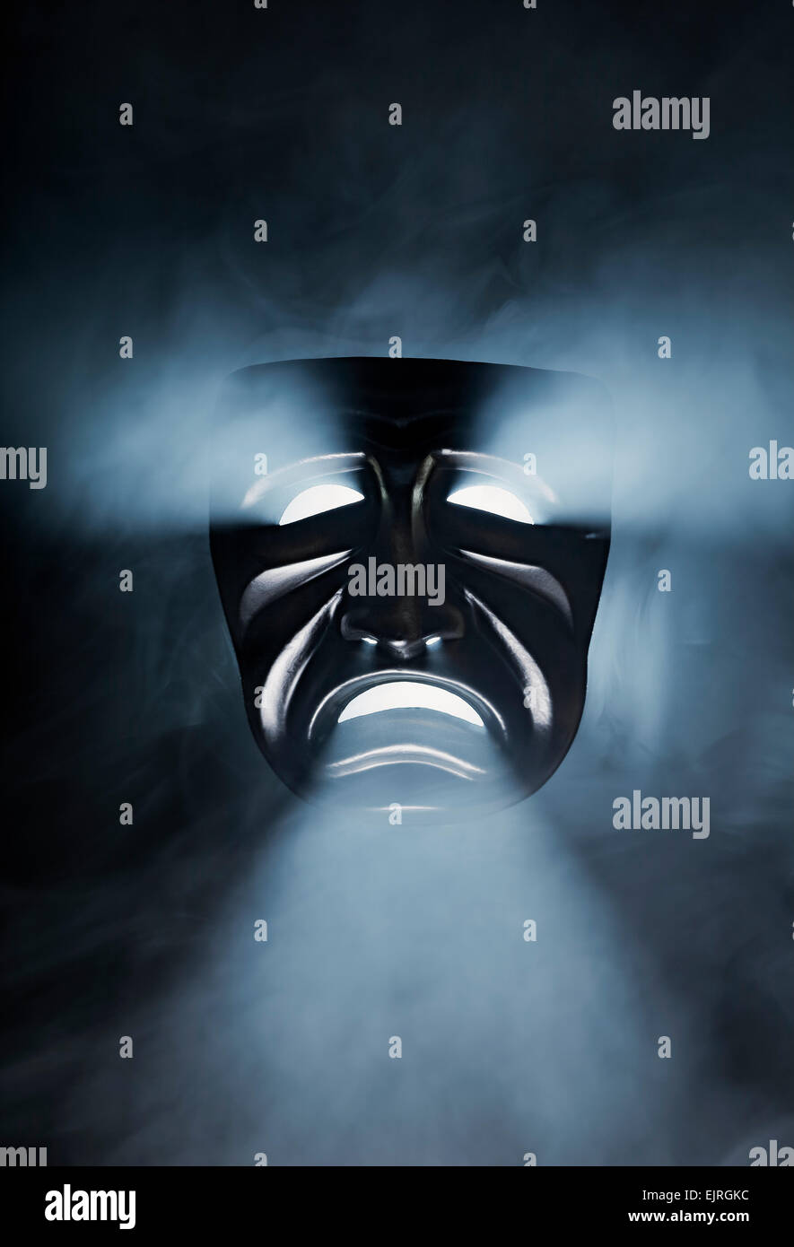 Sad depression mask emotion disguise Stockfotos und -bilder Kaufen - Alamy