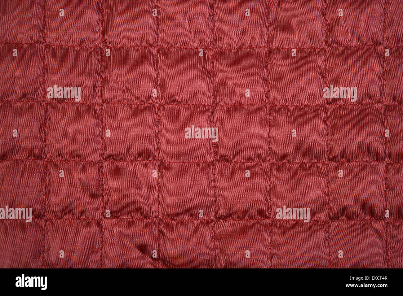 Roter Stoff Textur mit quadratischen Schnittmuster Stockfotografie - Alamy