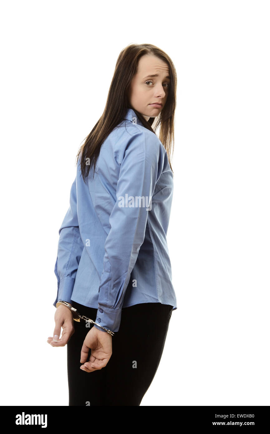 Business-Frau mit ihren Händen in Polizei Handschellen angekettet ...