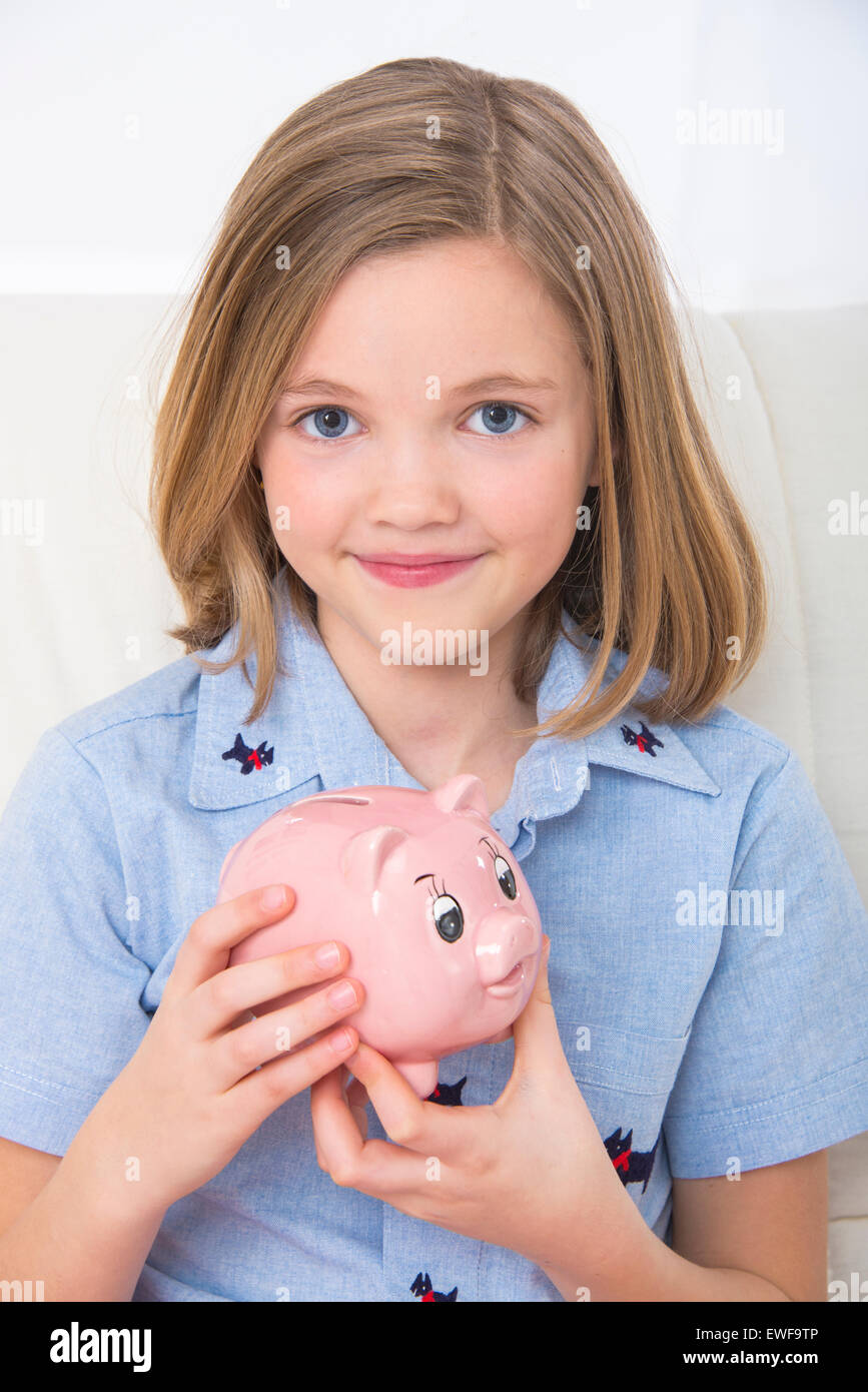 Kind geld -Fotos und -Bildmaterial in hoher Auflösung – Alamy