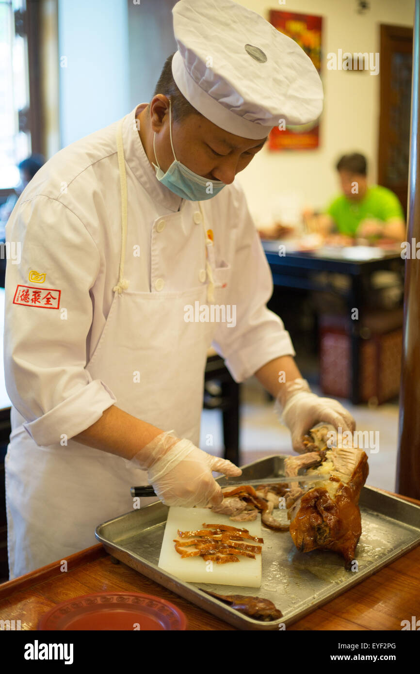 Schnitzende pekingente Stockfotos und -bilder Kaufen - Alamy