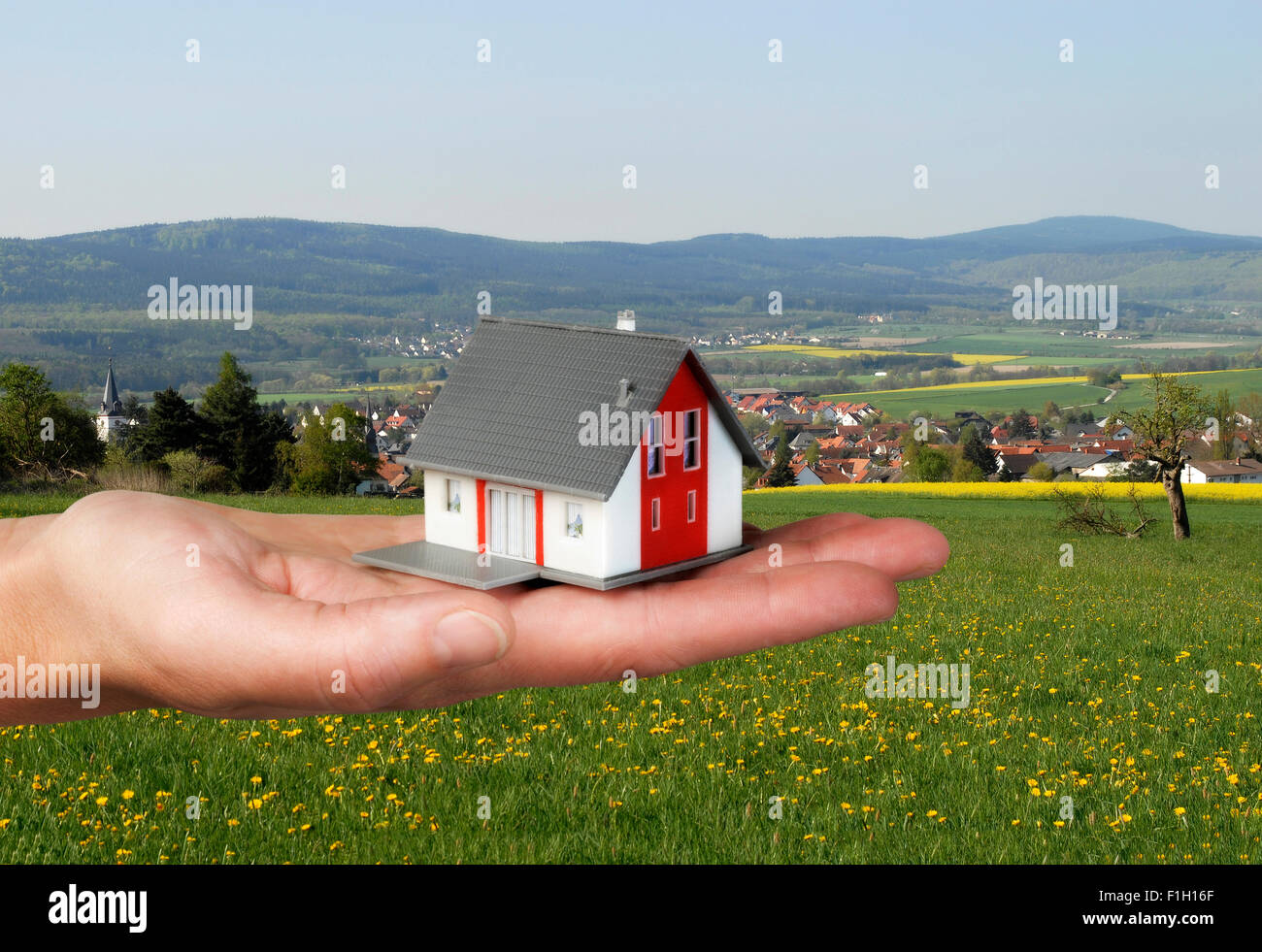 Haus an hand symbol -Fotos und -Bildmaterial in hoher Auflösung – Alamy