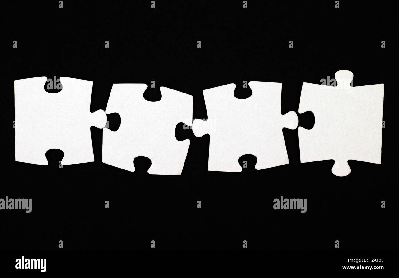 Four jigsaw puzzle pieces on -Fotos und -Bildmaterial in hoher ...