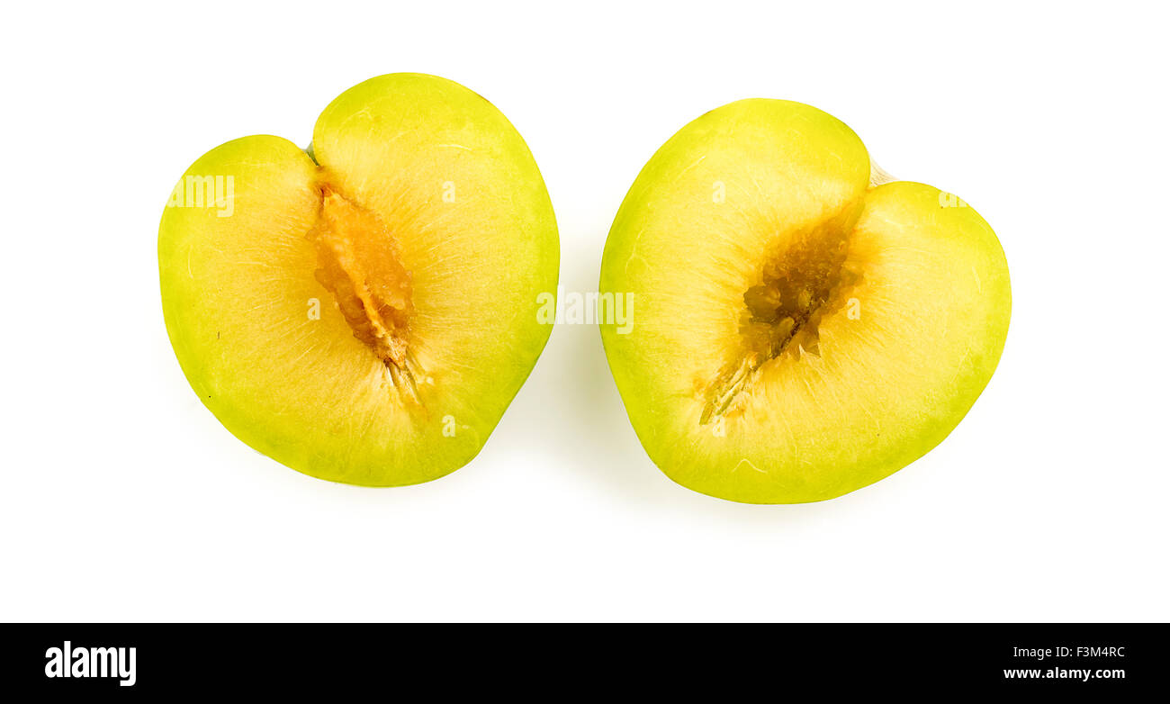 Innen saftig grüne Pflaume mit Saatgut und Kern Stockfotografie - Alamy
