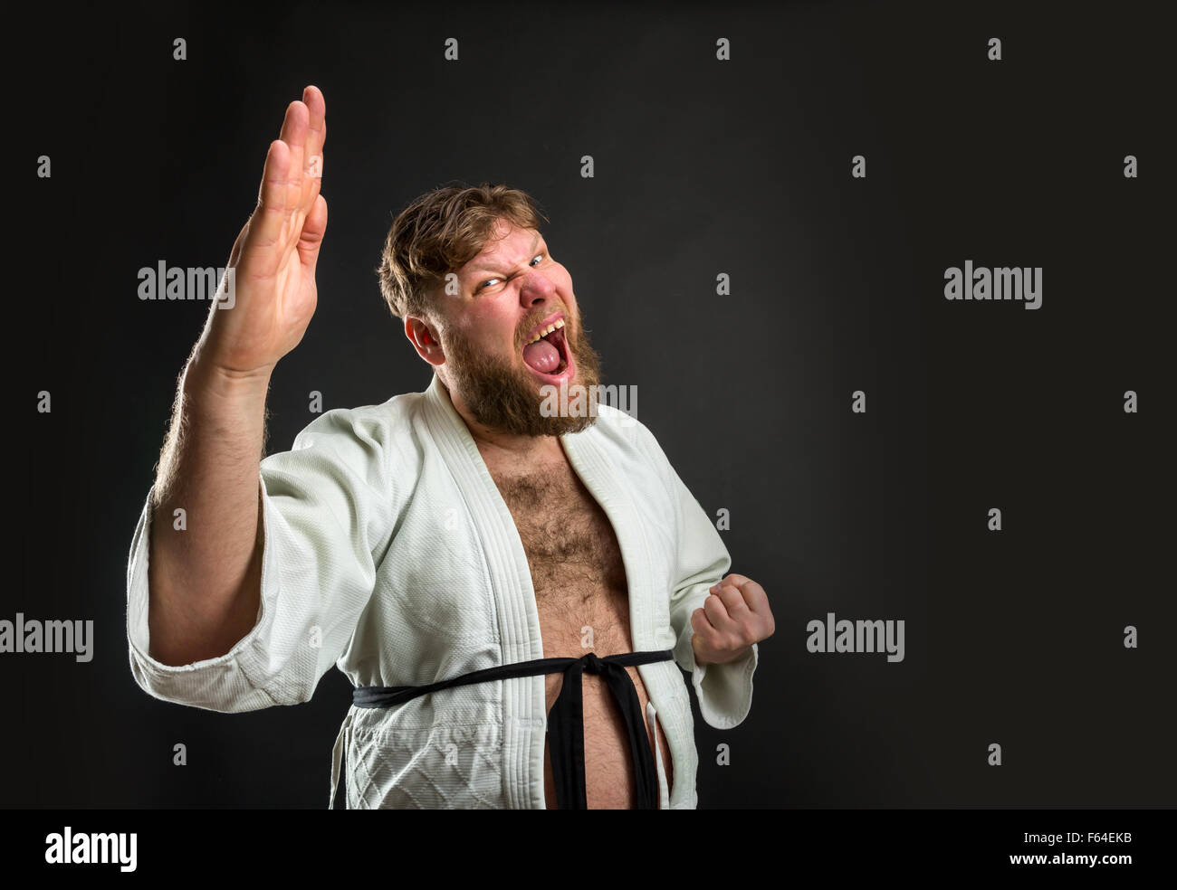 Fat karate fighter in white -Fotos und -Bildmaterial in hoher Auflösung ...