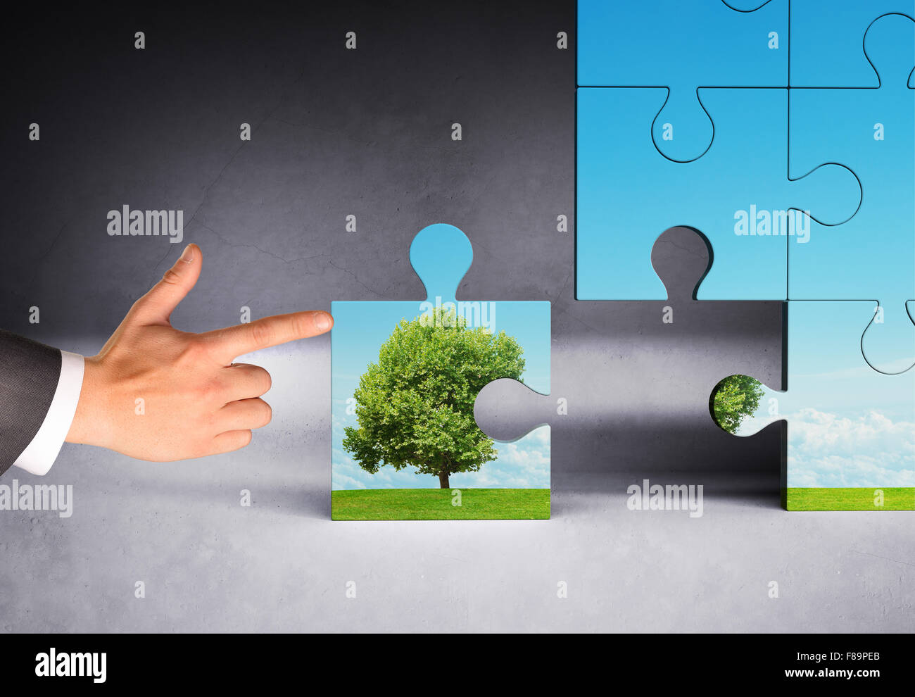 Man pushing puzzle piece -Fotos und -Bildmaterial in hoher Auflösung ...