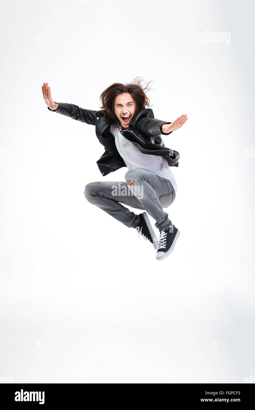Handsome begeistert junge Menschen springen und schreien auf weißem ...