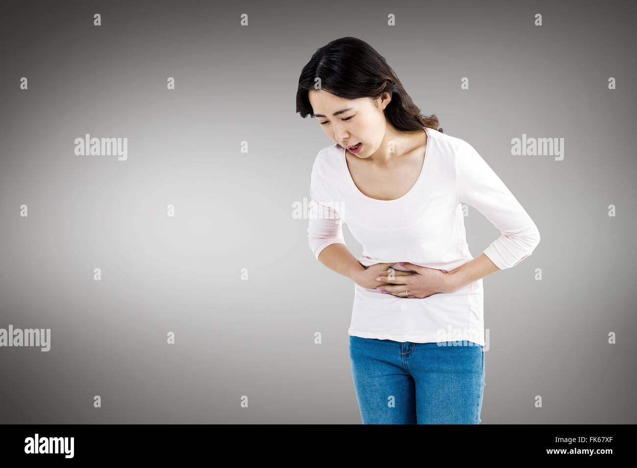 Stomach pain -Fotos und -Bildmaterial in hoher Auflösung – Alamy