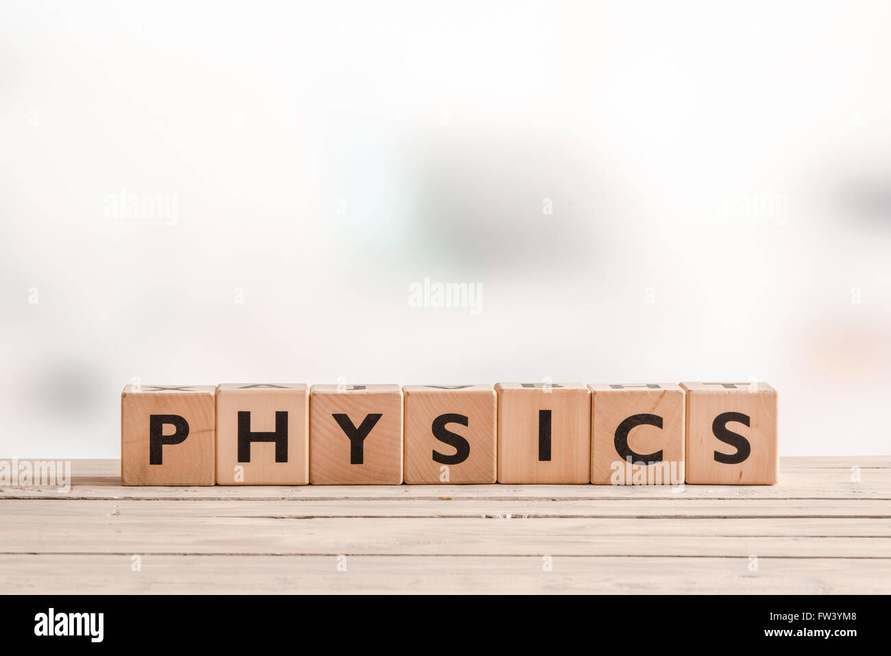 Physik Zeichen von festen Würfel auf dem Schreibtisch Stockfotografie ...