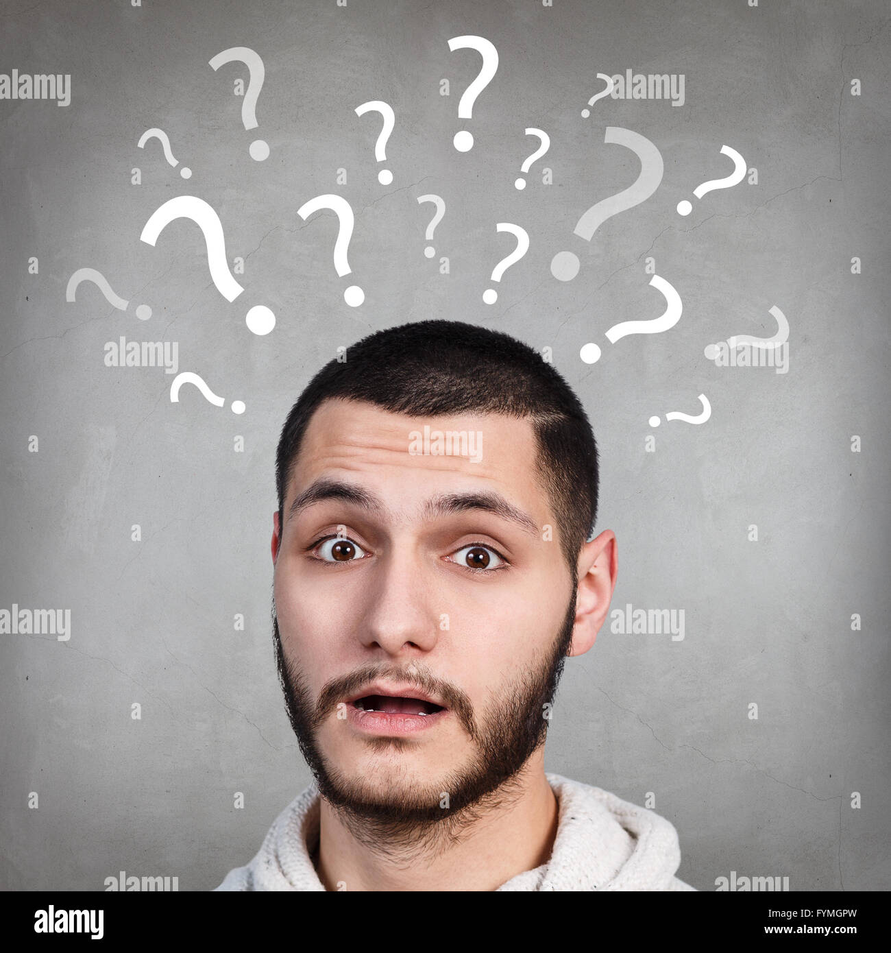Mann mit zeichen zu fragen -Fotos und -Bildmaterial in hoher Auflösung ...