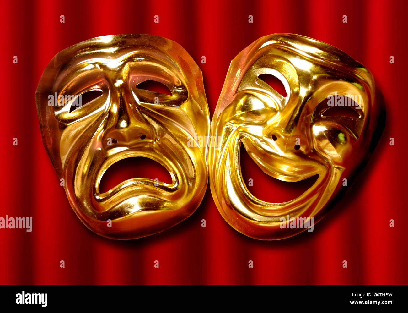 Goldene Theatermasken aus Komödie und Tragödie Stockfotografie - Alamy