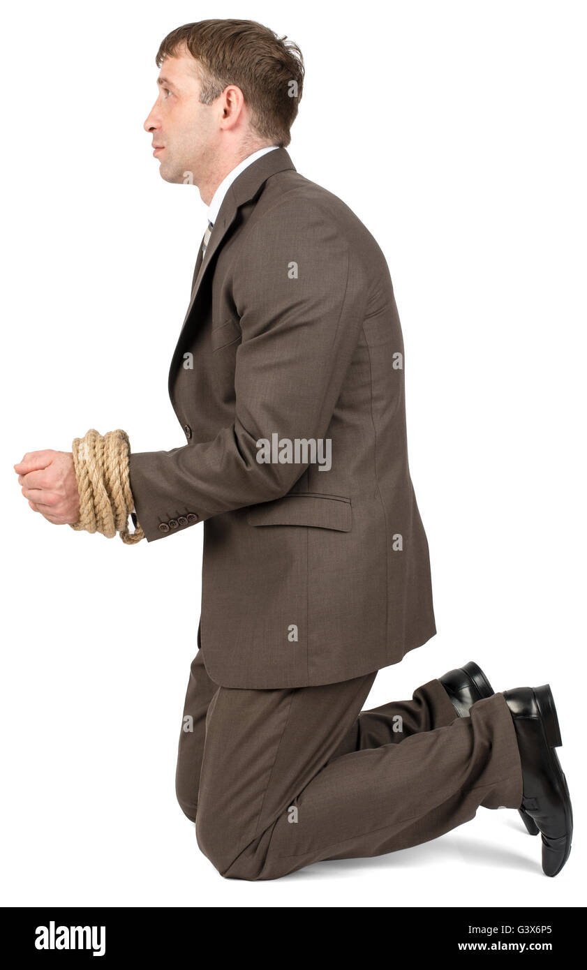 Man kneeling -Fotos und -Bildmaterial in hoher Auflösung – Alamy