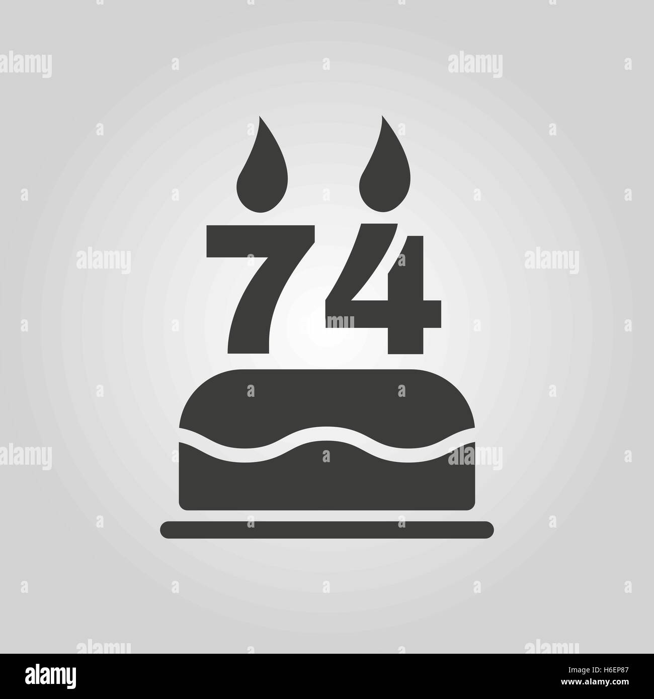 Die Geburtstagstorte mit Kerzen in Form von Nummer 74-Symbol ...