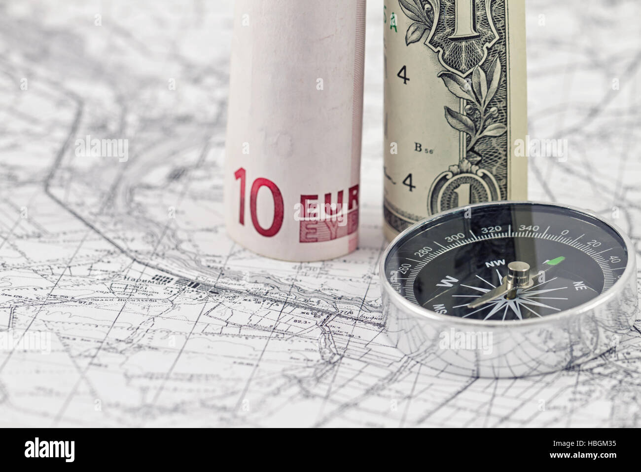 Kompass geld -Fotos und -Bildmaterial in hoher Auflösung – Alamy