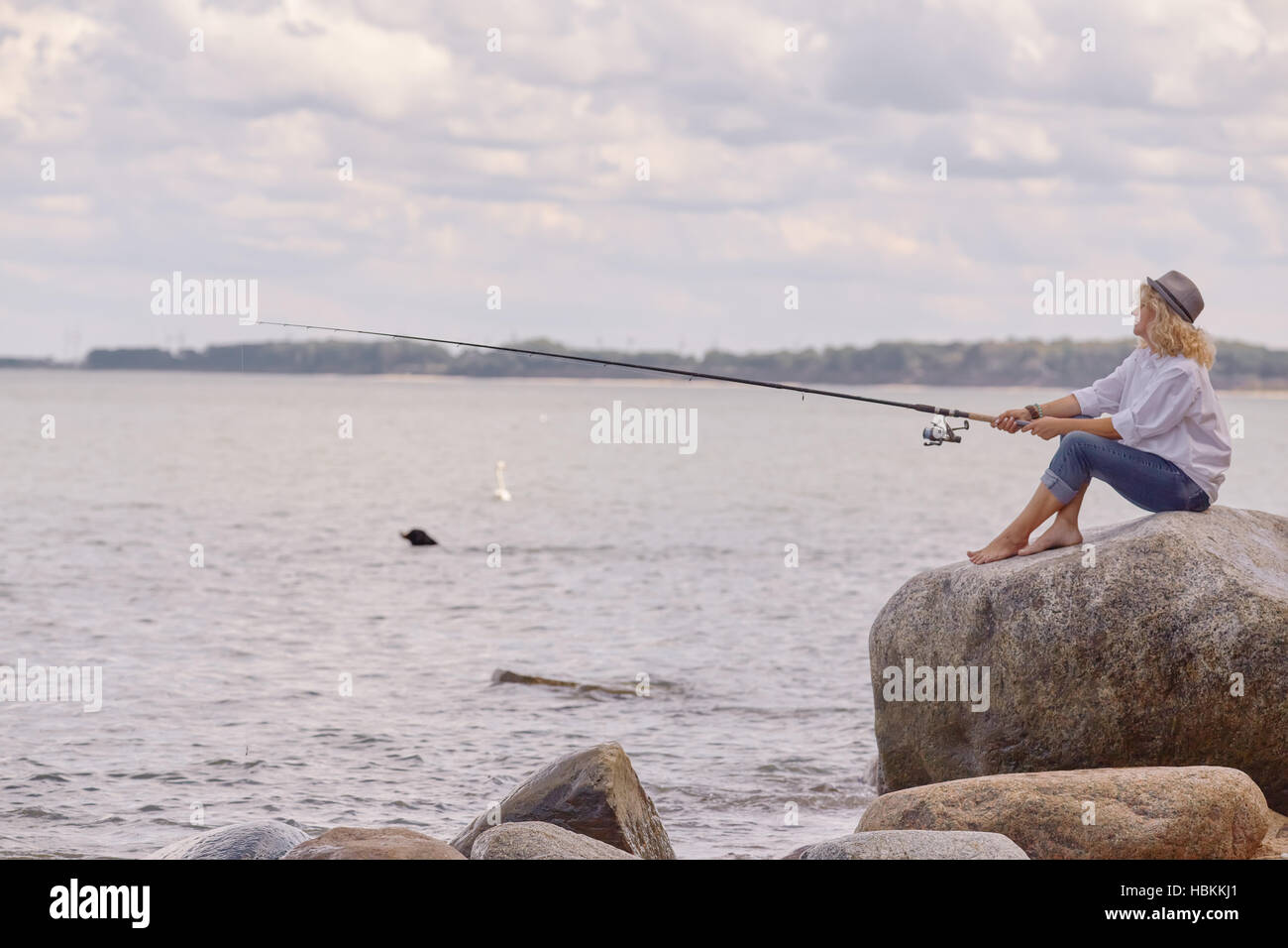 Sitzende fischerfrau Stockfotos und -bilder Kaufen - Alamy
