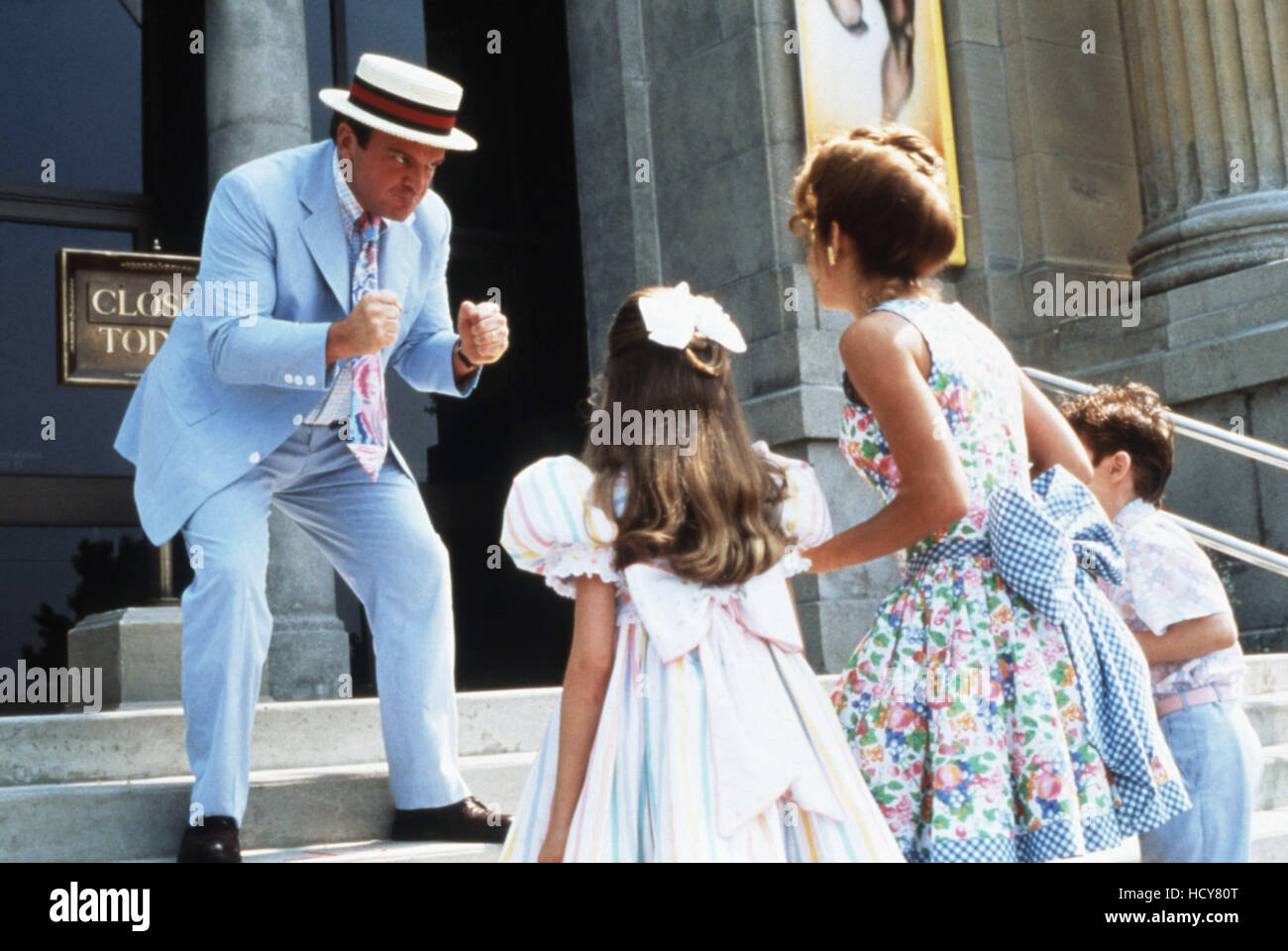 THE STUPIDS, Tom Arnold (facing front), back to camera from left: Alex ...