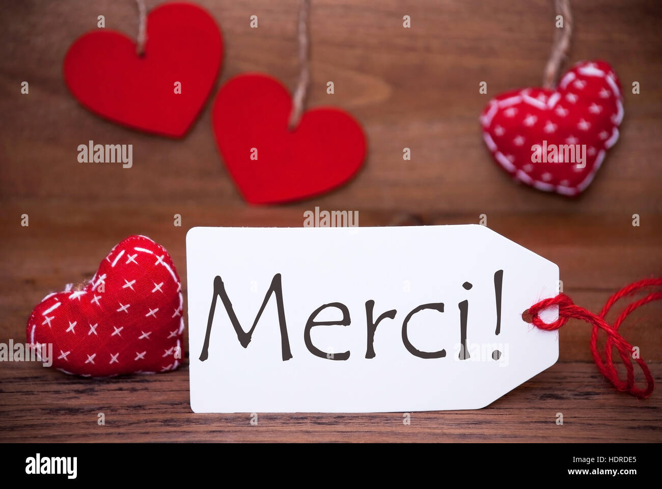 Lesen Sie Herzen, Label, Merci bedeutet vielen Dank Stockfotografie - Alamy