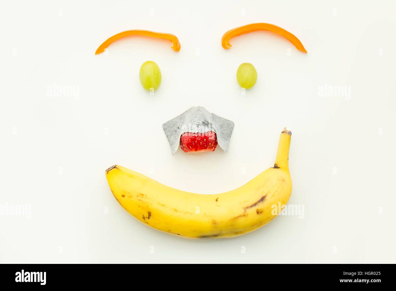 Lächelndes Gesicht mit Obst und Gemüse, Lebensmittel Kunst gemacht ...