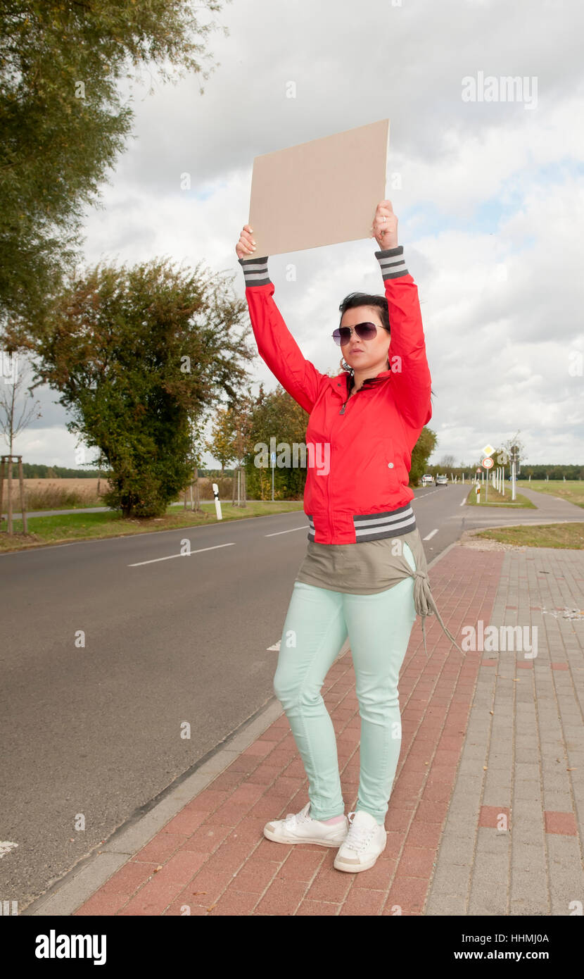 Tramper mit Schild Stockfotografie - Alamy