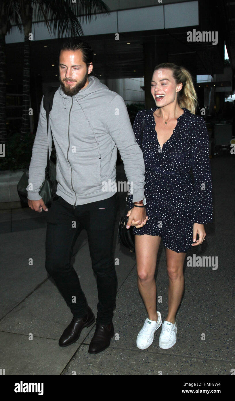 Margot Robbie und ihr Mann Tom Ackerley am Los Angeles International ...