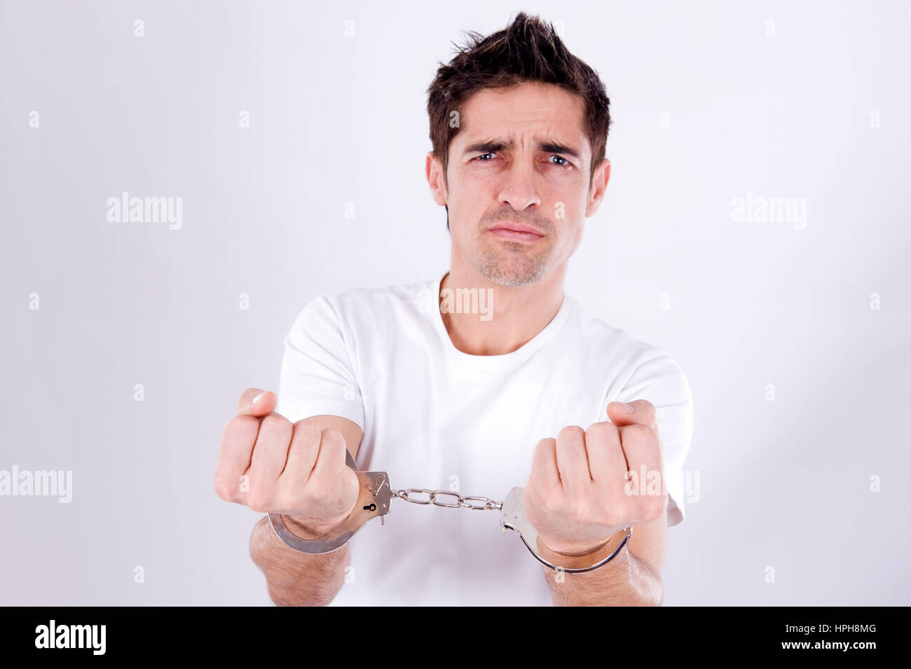 Handschellen Angelegt Stockfotos und -bilder Kaufen - Alamy