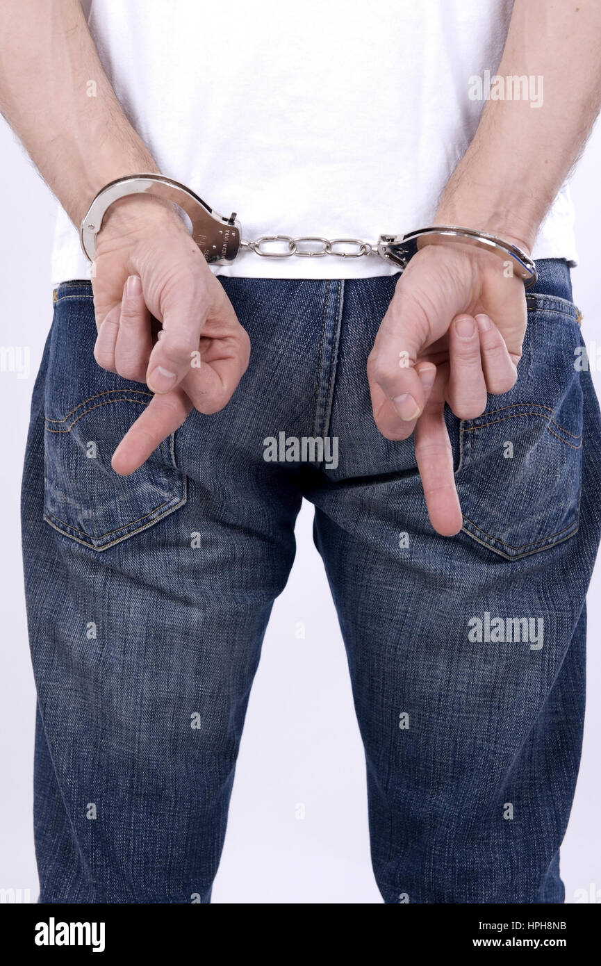 Handschellen Angelegt Stockfotos und -bilder Kaufen - Alamy